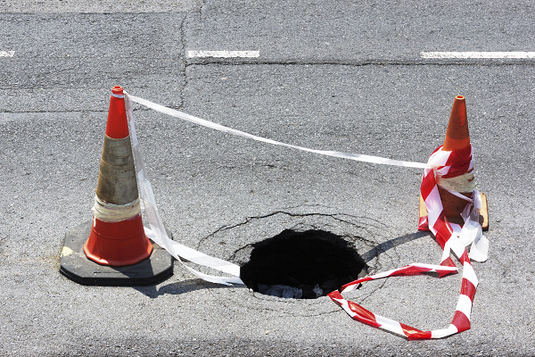 Signs of a Sinkhole, And What to Do If You Think You See One - Concrete ...
